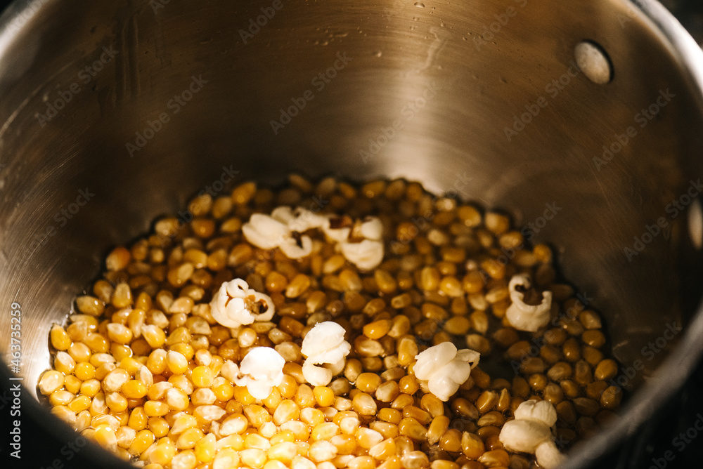 Cooking popcorn on the stove Stock Photo | Adobe Stock