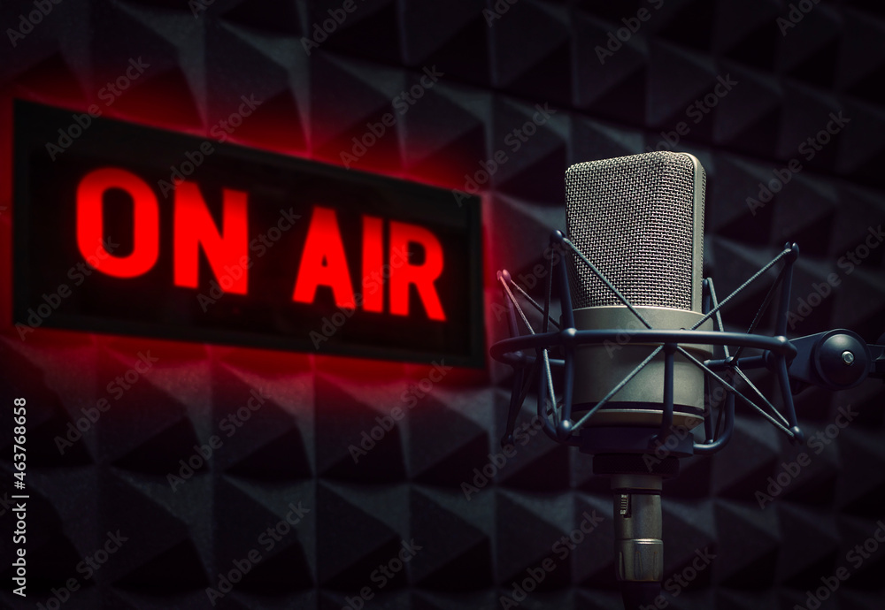 Professional microphone in radio station studio and on air sign Stock ...