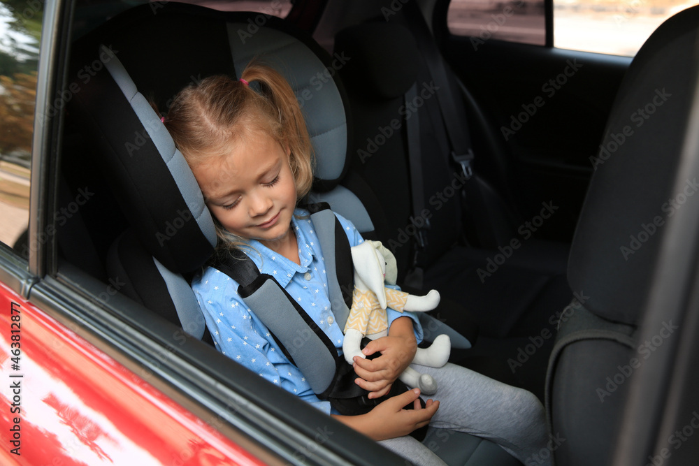Cute little girl sleeping in child safety seat inside car Stock Photo ...