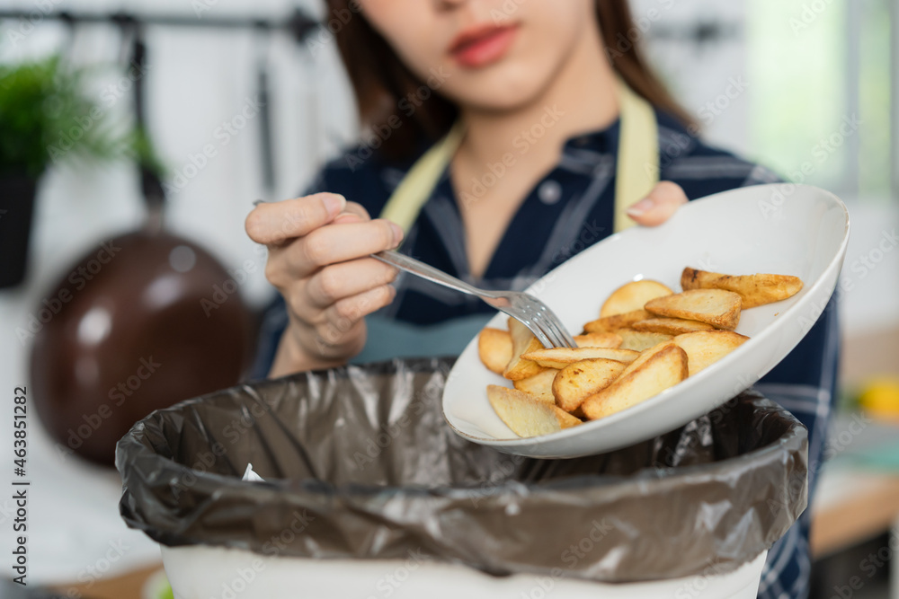 Throwing Food In Garbage