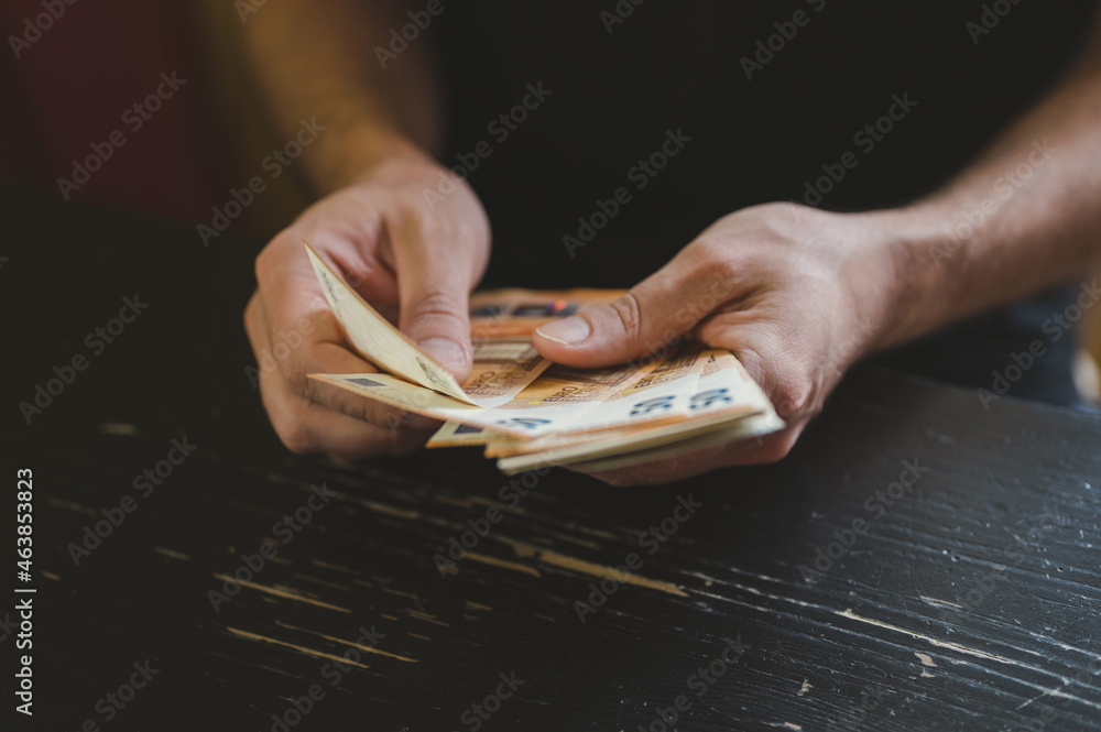 business man counting money. rich male hands holds and count cash ...