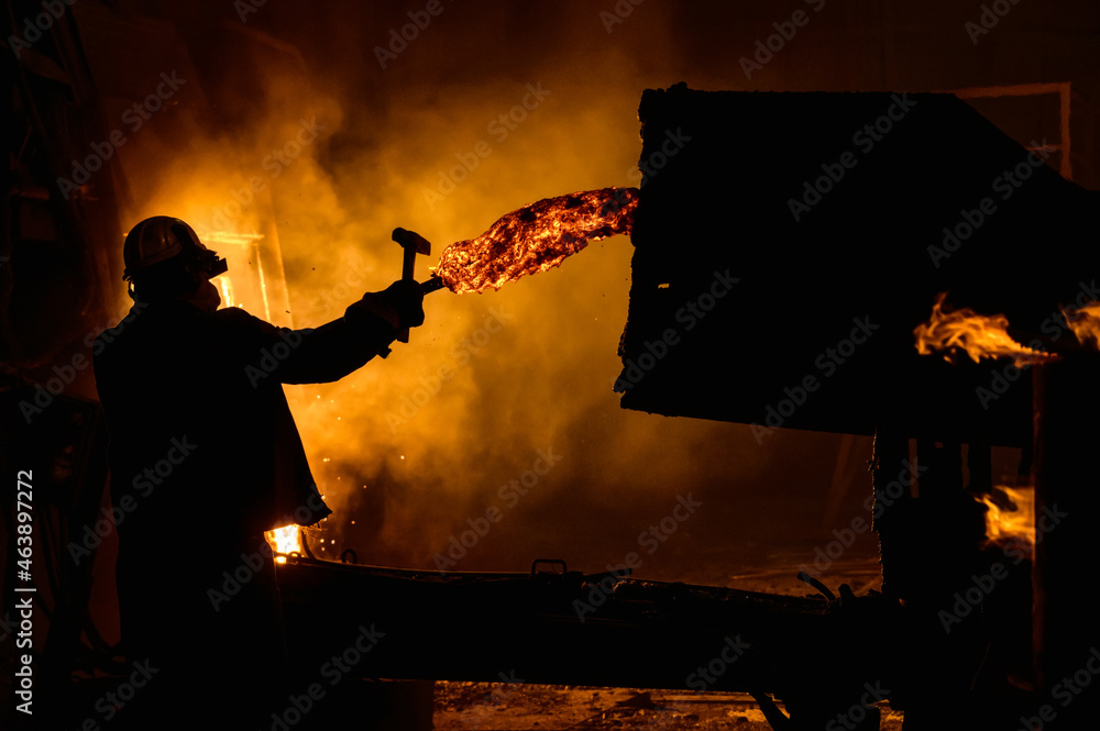 process of taking a sample of liquid metal in a steelmaking furnace ...