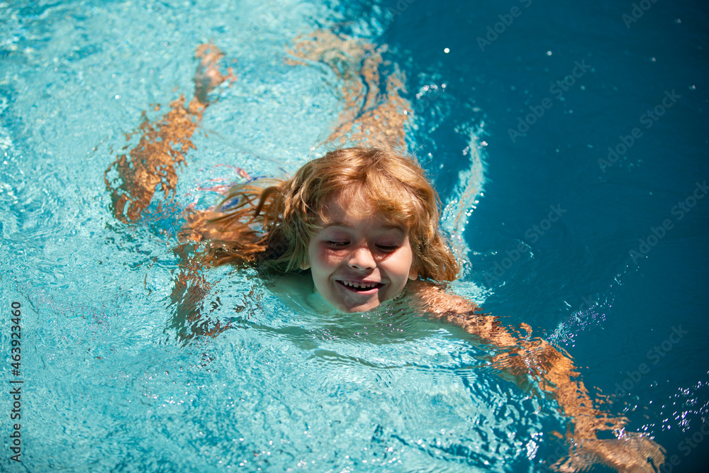 Kid boy swim in swimming pool water. Kid playing outdoors. Summer ...