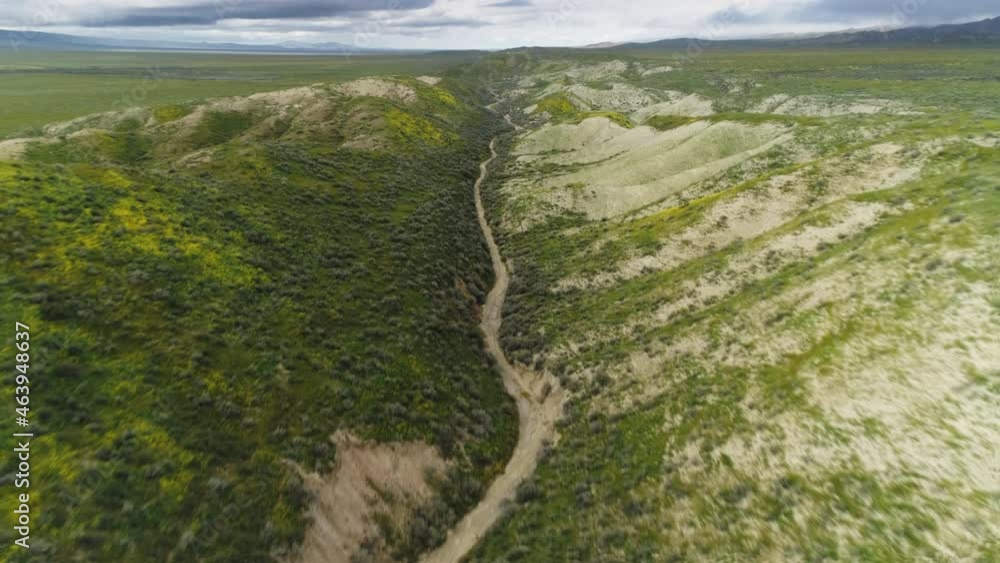 Cinematic close up view on trail in the middle of San Andreas fault ...