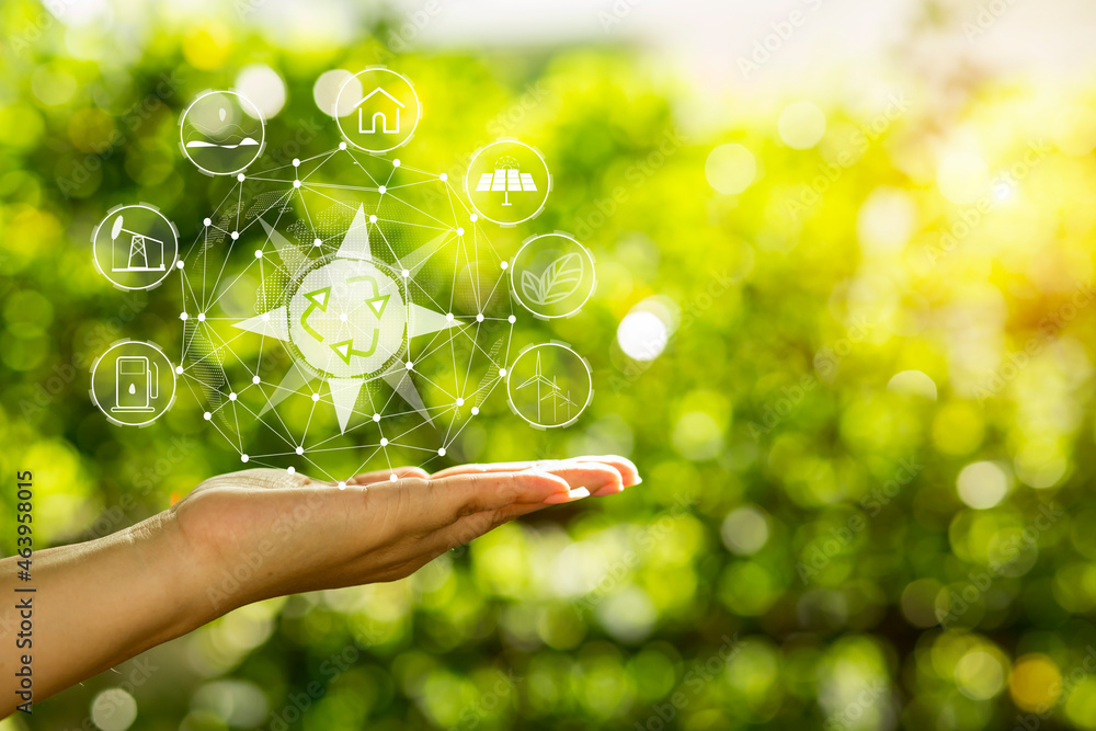 Technology, hand holding with environment Icons over the Network ...