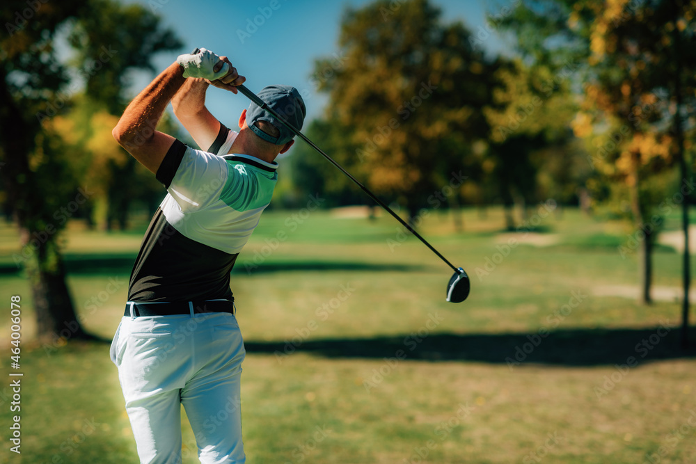 Golf swing with the driver golf club, shot from behind Stock Photo ...