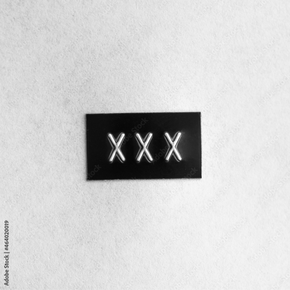 Photograph of a classic black embossed plastic label sticker printed ...