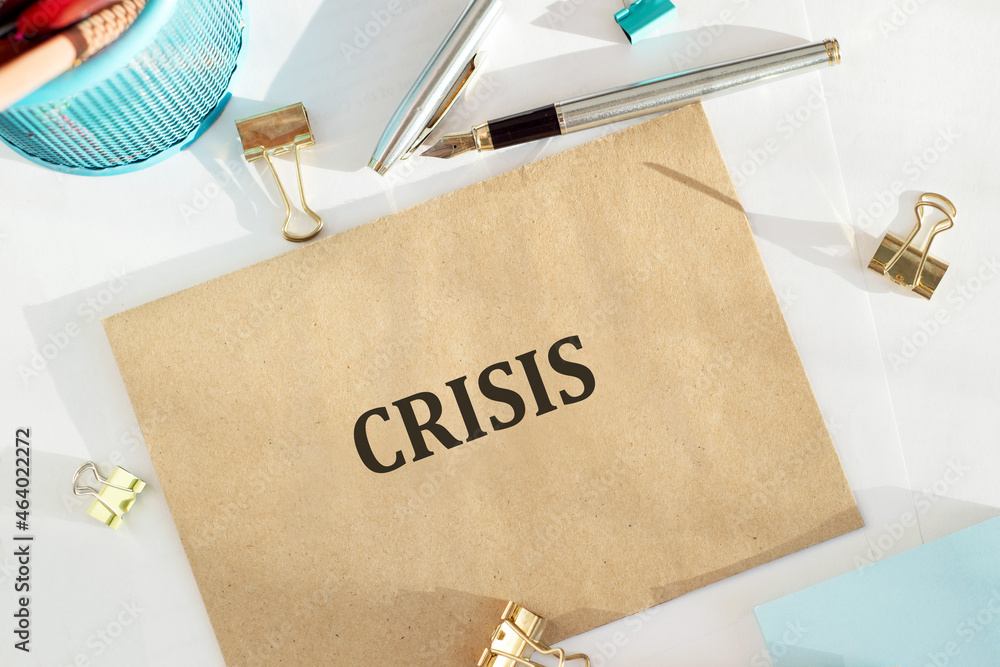 Cravt envelope with CRISIS note on the office desk, concept. Stock ...