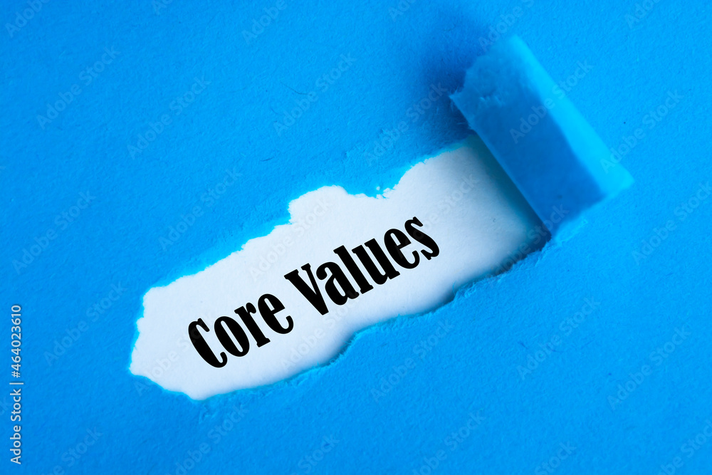 Core Values Message written under torn paper. Stock Photo | Adobe Stock