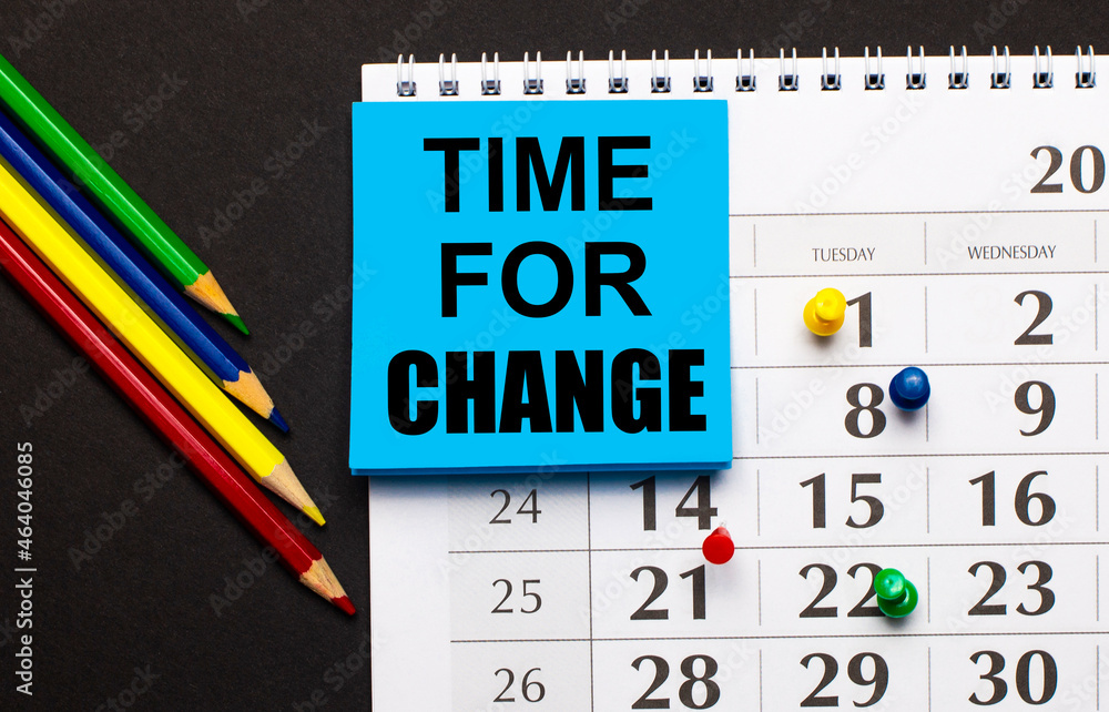 On a black background, a calendar with colored buttons, multi-colored ...