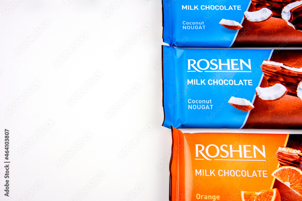 Roshen Dark chocolate bar with almond isolated on white made by Roshen ...