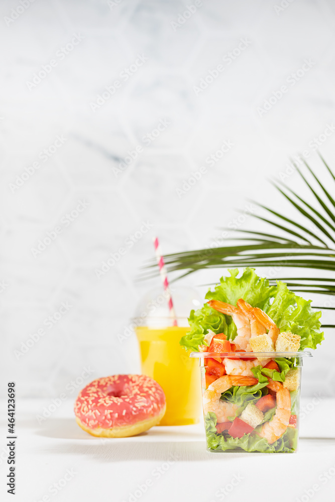 Wellness summer food take away set of orange juice, pink donut ...