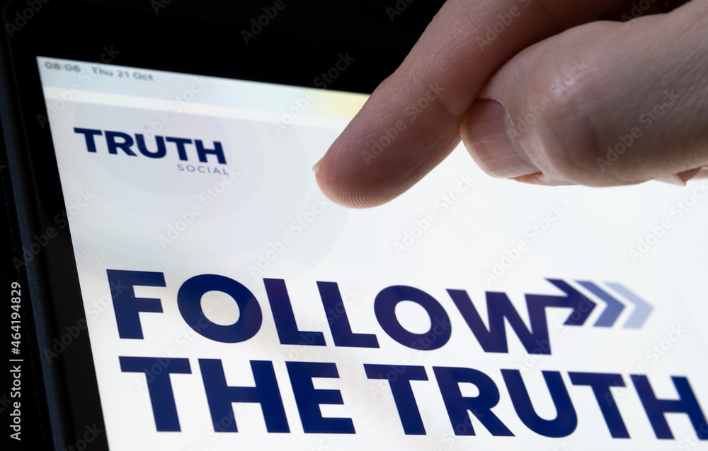 Truth Social app logo seen on the smartphone and the Follow the fruth ...
