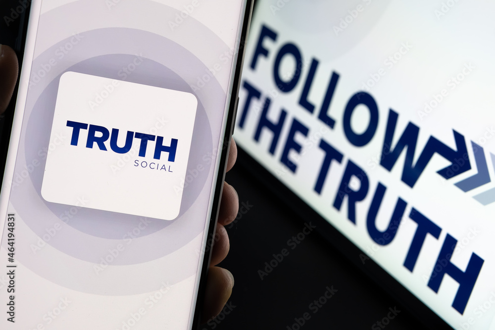Truth Social app logo seen on the smartphone and the Follow the fruth ...
