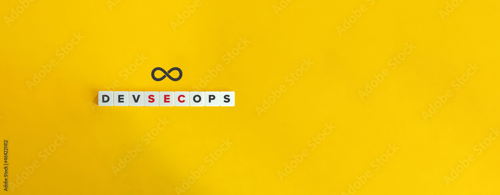 DevSecOps banner and concept. Block letters on bright orange background ...