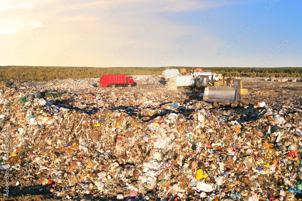 Landfill waste disposal. Garbage dump with waste plastic and ...
