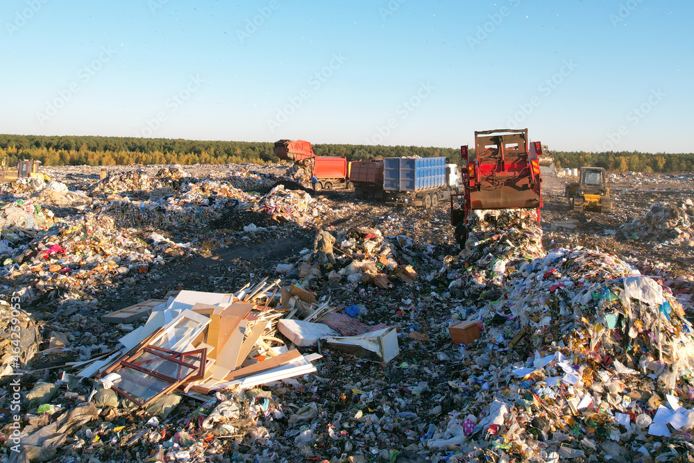 Landfill waste disposal. Garbage dump with waste plastic and ...