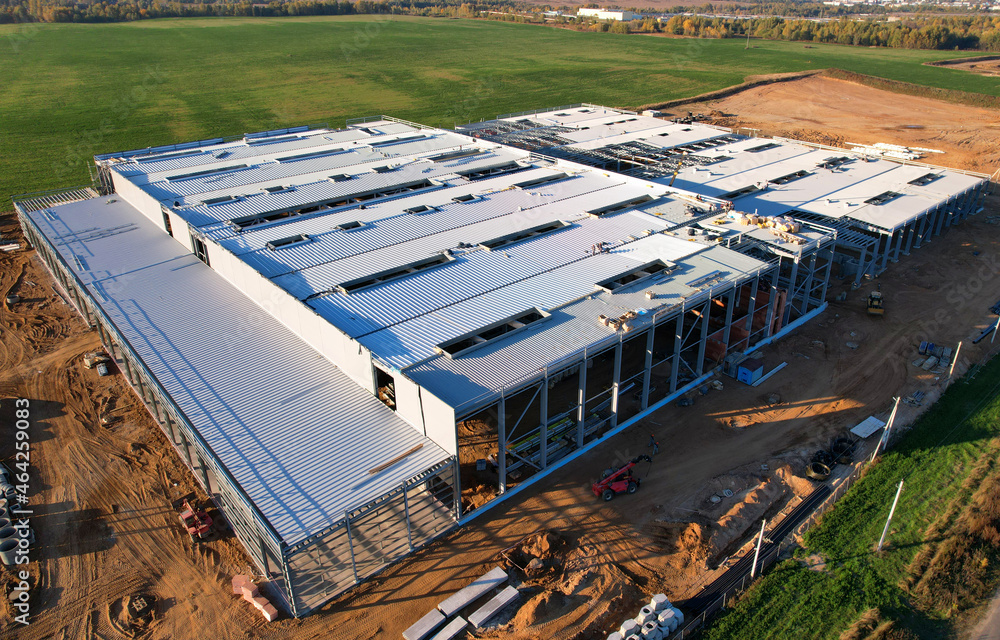 Warehouse Construction from metal structure. Industrial building on ...