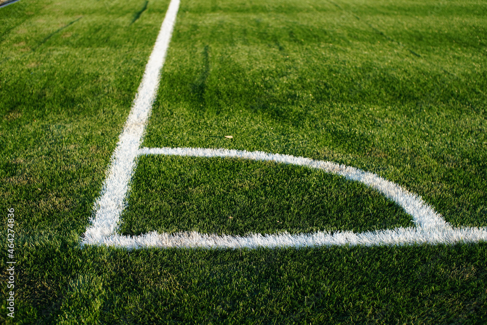 green synthetic grass surface on a soccer ground, european football ...