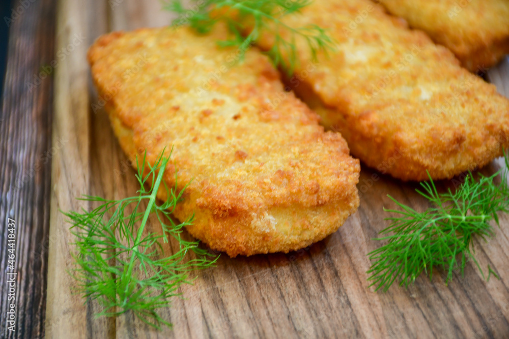 Close up of Crispy breaded deep fried fish fingers with breadcrumbs ...