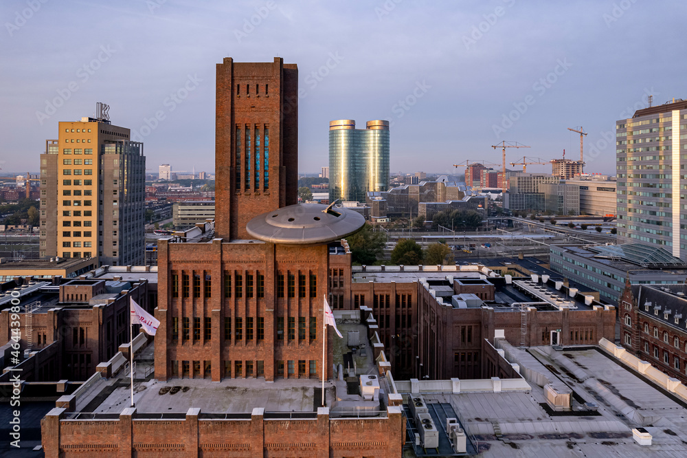 Front exterior facade of Inktpot bricked building with UFO resting on ...