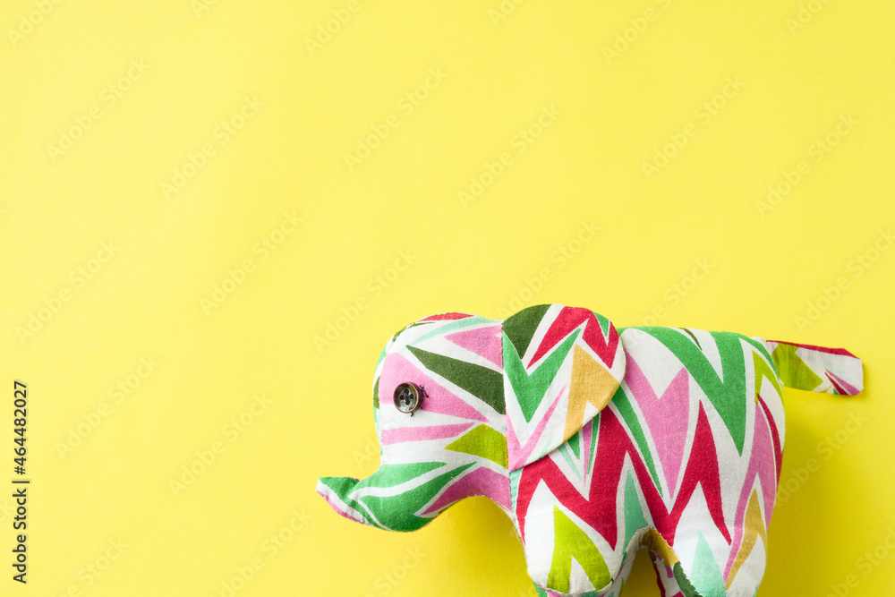 Baby elephant on a green background. Cute soft baby elephant toy on a ...