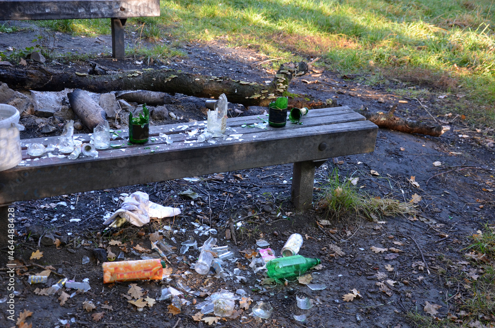 vandalism in the park. after the night party, only shattered pieces of ...