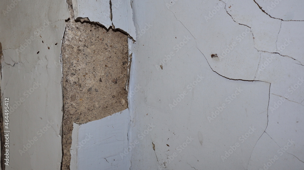 Cement wall collapse. Cracked concrete old wall. dangerous, damaged ...
