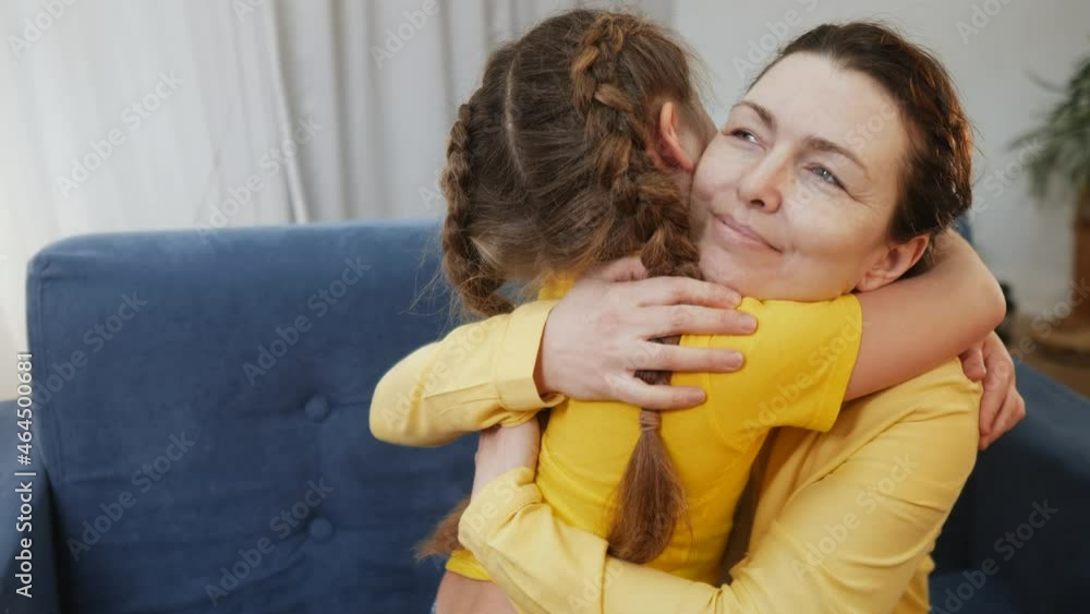 Video Stock daughter hugs mom. happy family a lockdown stay home ...