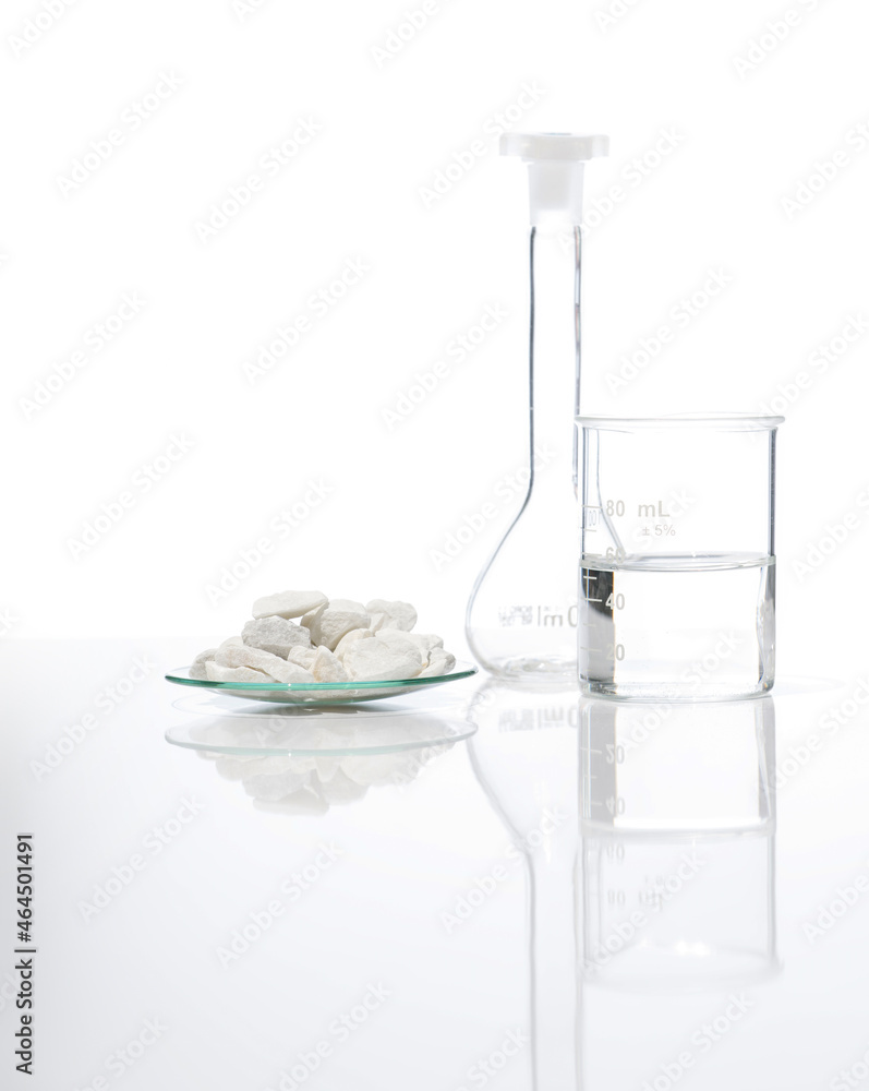 Close up chemical ingredient on white laboratory table. Calcium ...