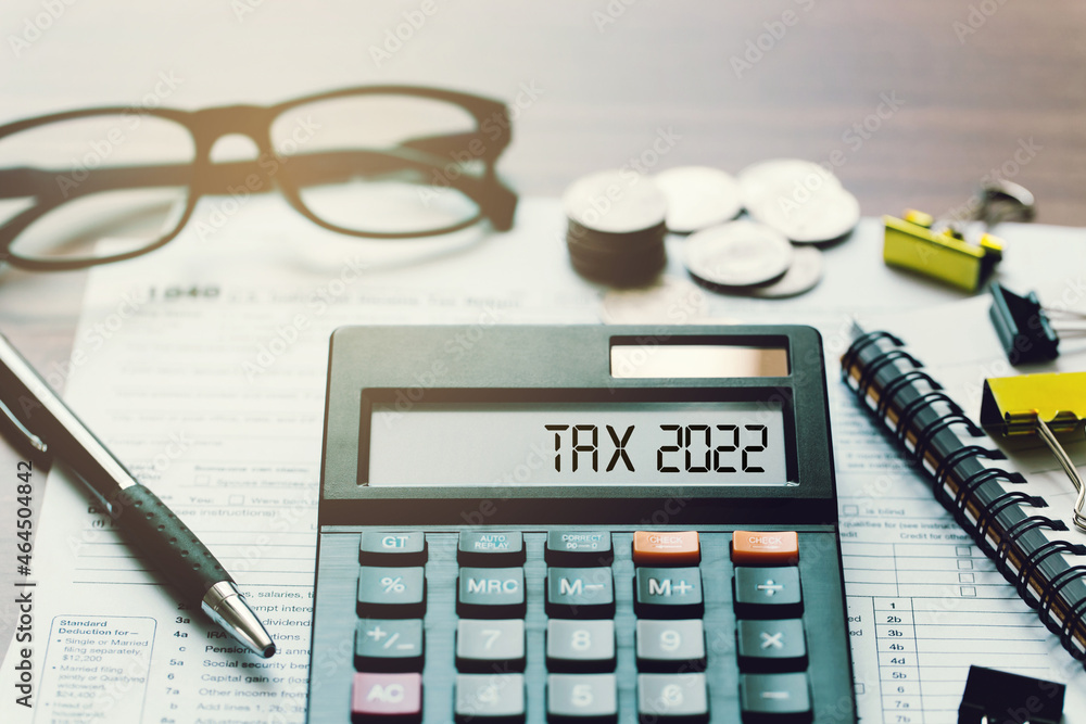 Word Tax 2022 on the calculator. Business and tax concept.Calculator ...