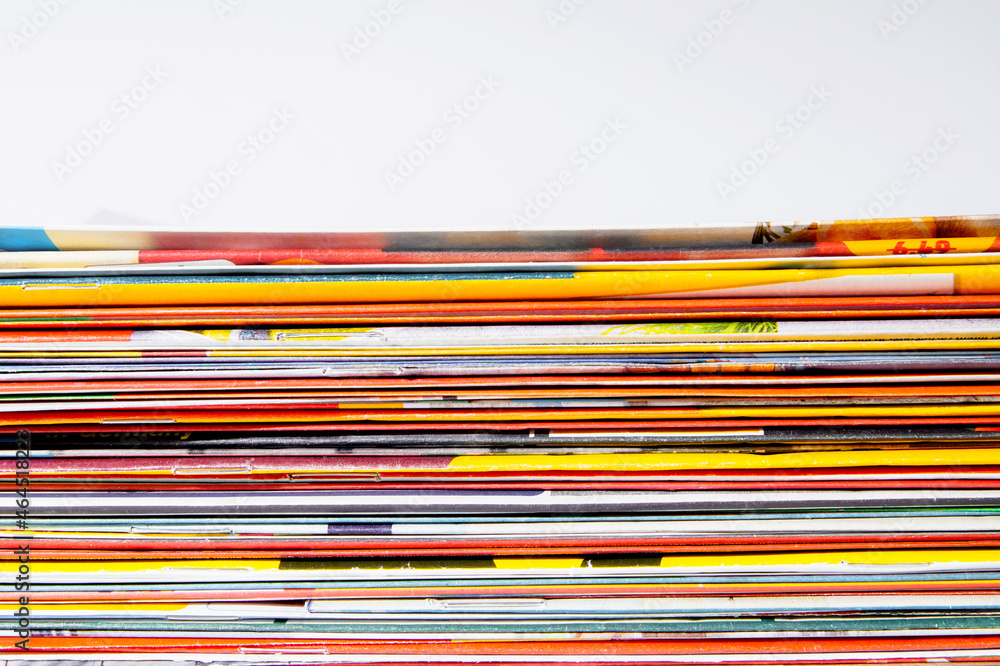 Stack of magazines. Pile of supermarket advertising brochures. Folded ...