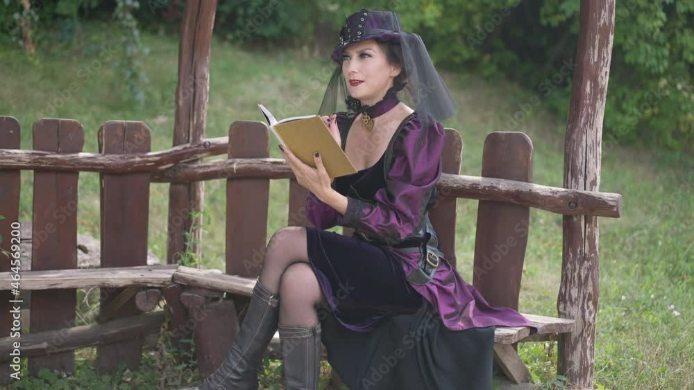 Wide shot intelligent slim gorgeous woman in steampunk witch costume ...