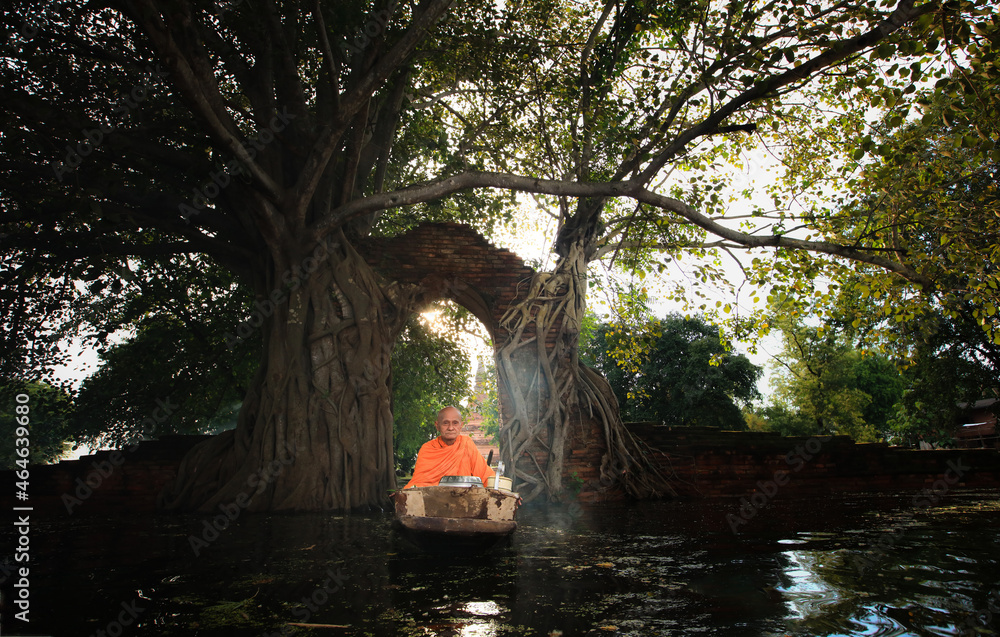 Monk transport by boat pass ancient temple during flood in Ayutthaya ...