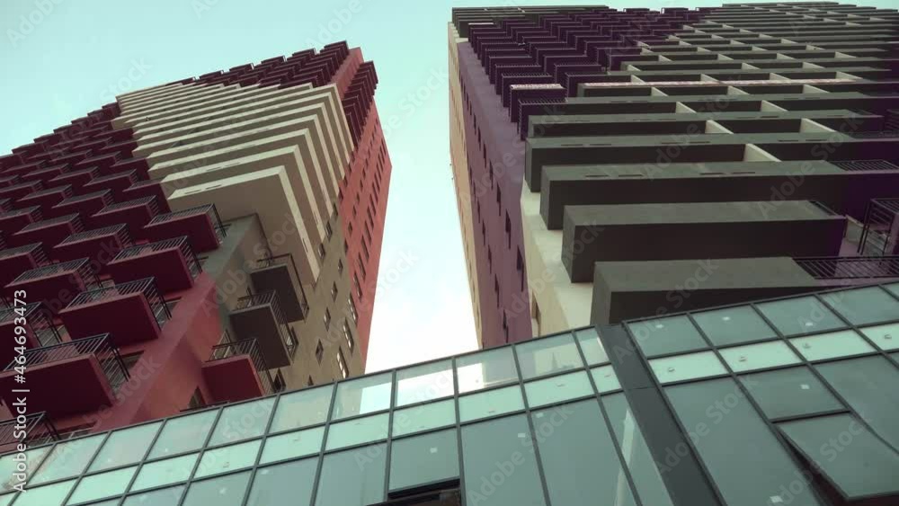 Newly built modern facade of a residential building. The exterior of a ...
