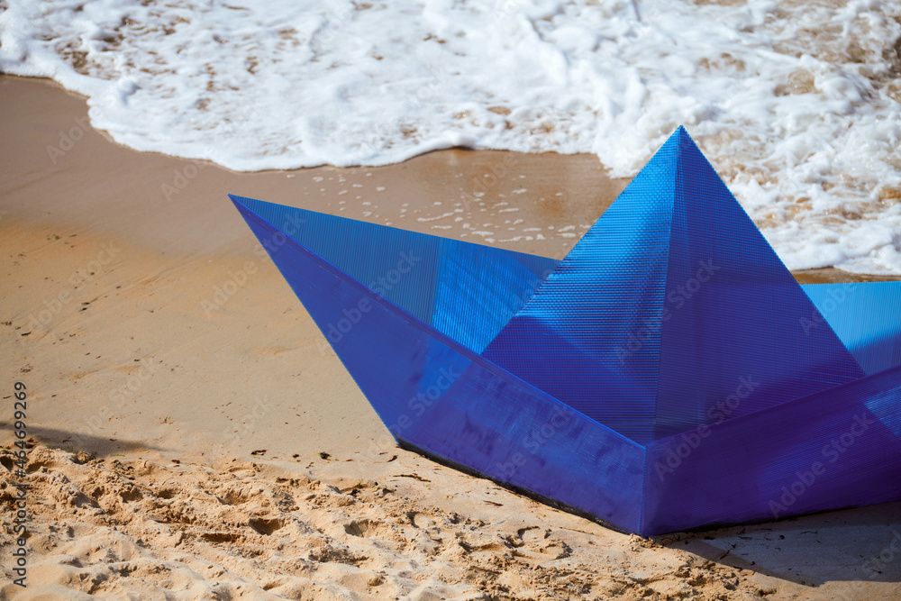 Origami blue paper boat on sandy beach for concept design, beautiful ...
