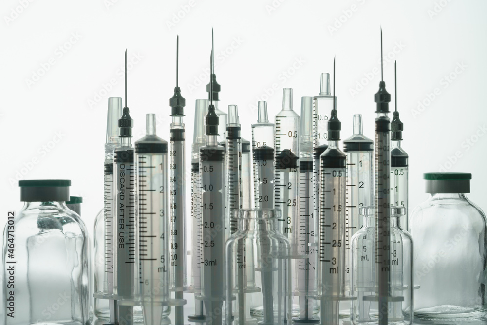 Vials of medicine and silhouette plastic syringe with needle. needle ...