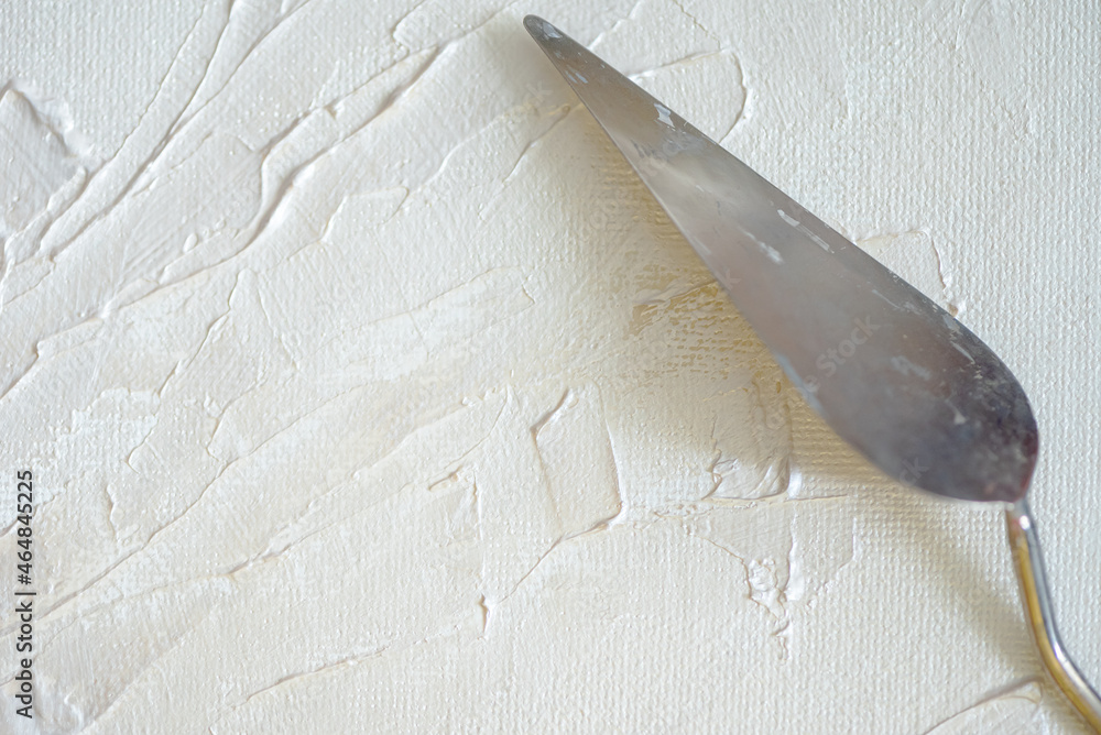 Palette Knife Placed to The White Painted Canvas Texture With Brush And ...