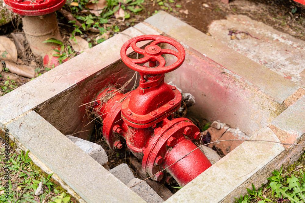 Foto de Red hydrant fire detail prevention system at fun land. do Stock ...
