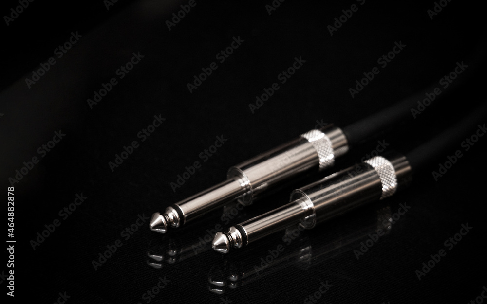 Two silver TRS connectors for the analog audio signal are placed ...