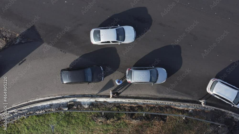 Traffic accident: Collision of two cars on the road. Aerial drone Top ...