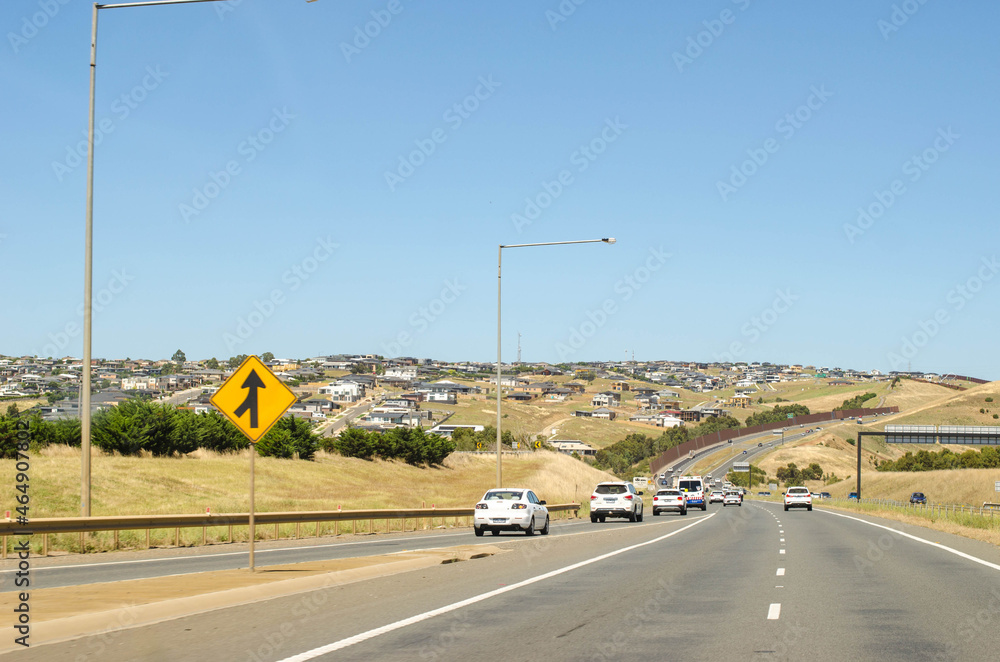 View of M1Princes freeway with many residential houses in the distance ...