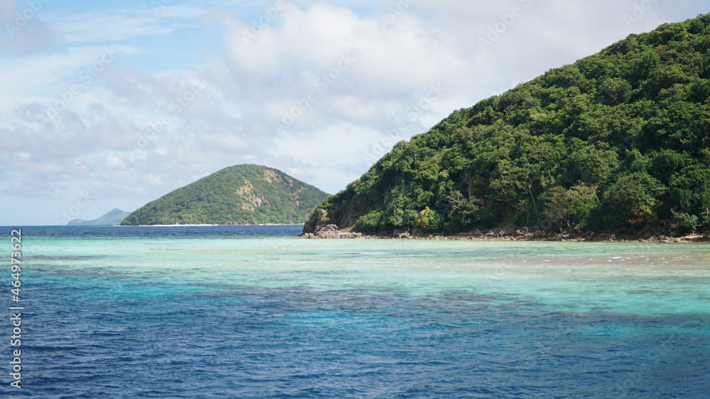 Ocean and jagged rock landscapes with turquoise water at Coron Island ...