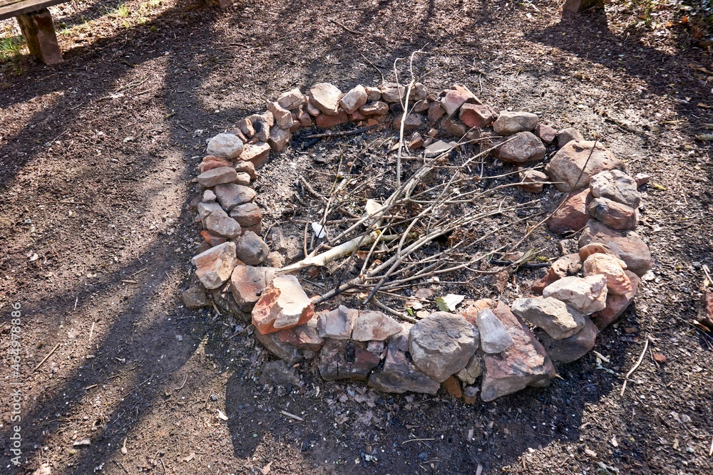 place for a campfire in the woods. a circle of stones for a picnic in ...