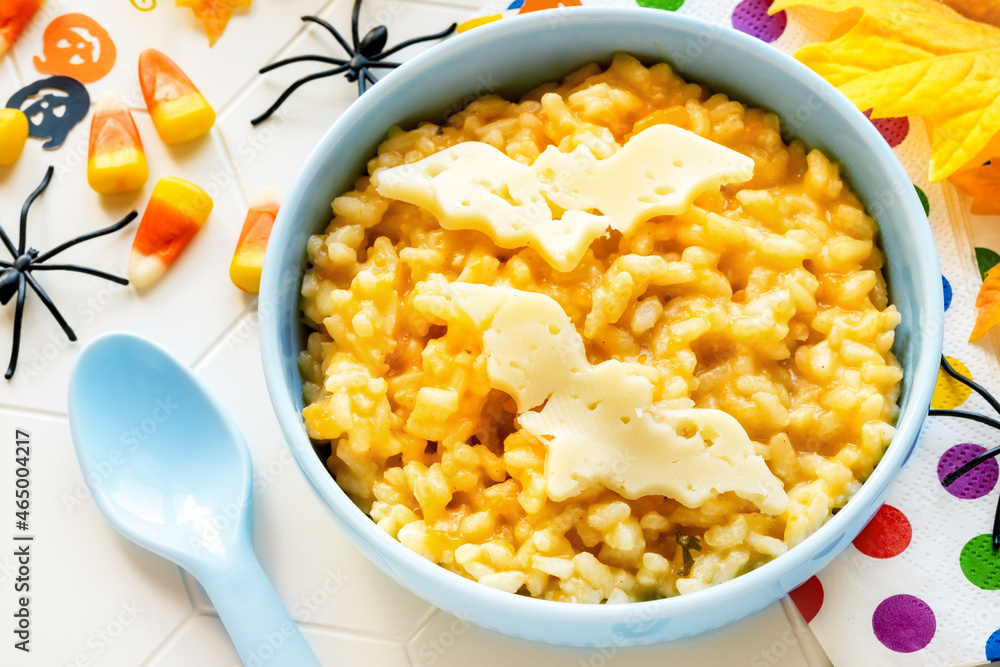 Fun Food for kids - Halloween pumpkin risotto with cinnamon decorated ...