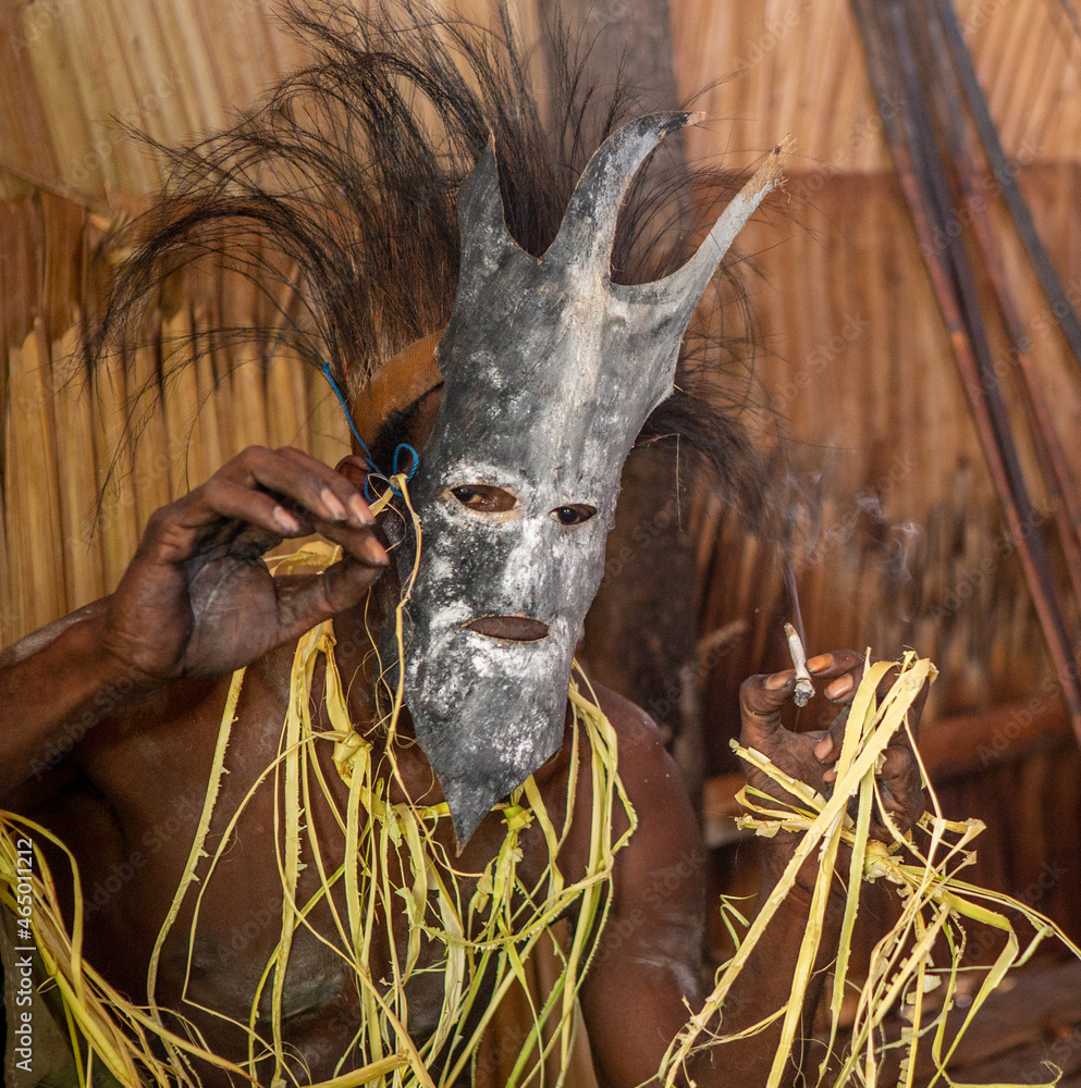 Warrior of the Asmat tribe in the ritual mask Stock Photo | Adobe Stock