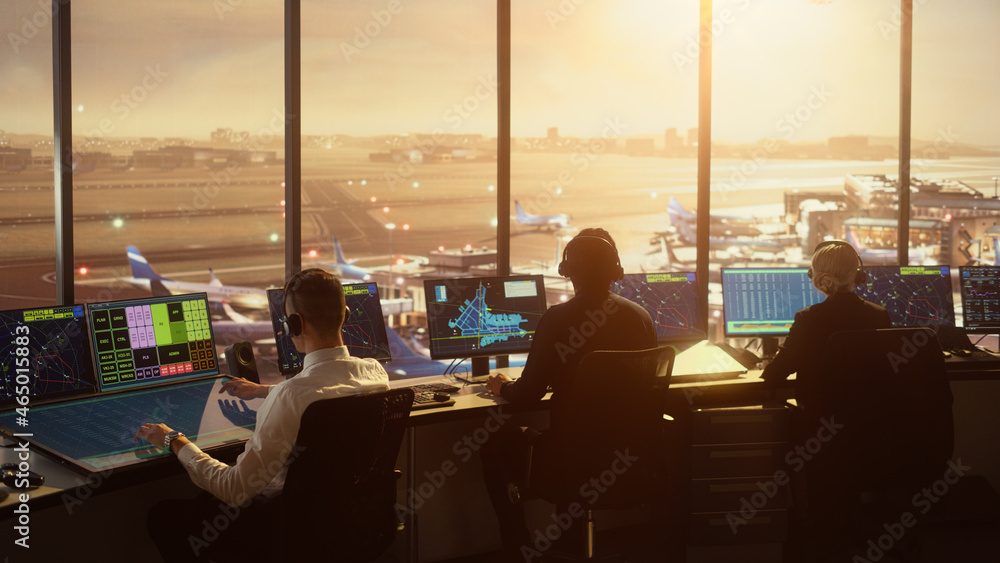 Diverse Air Traffic Control Team Working in a Modern Airport Tower at ...