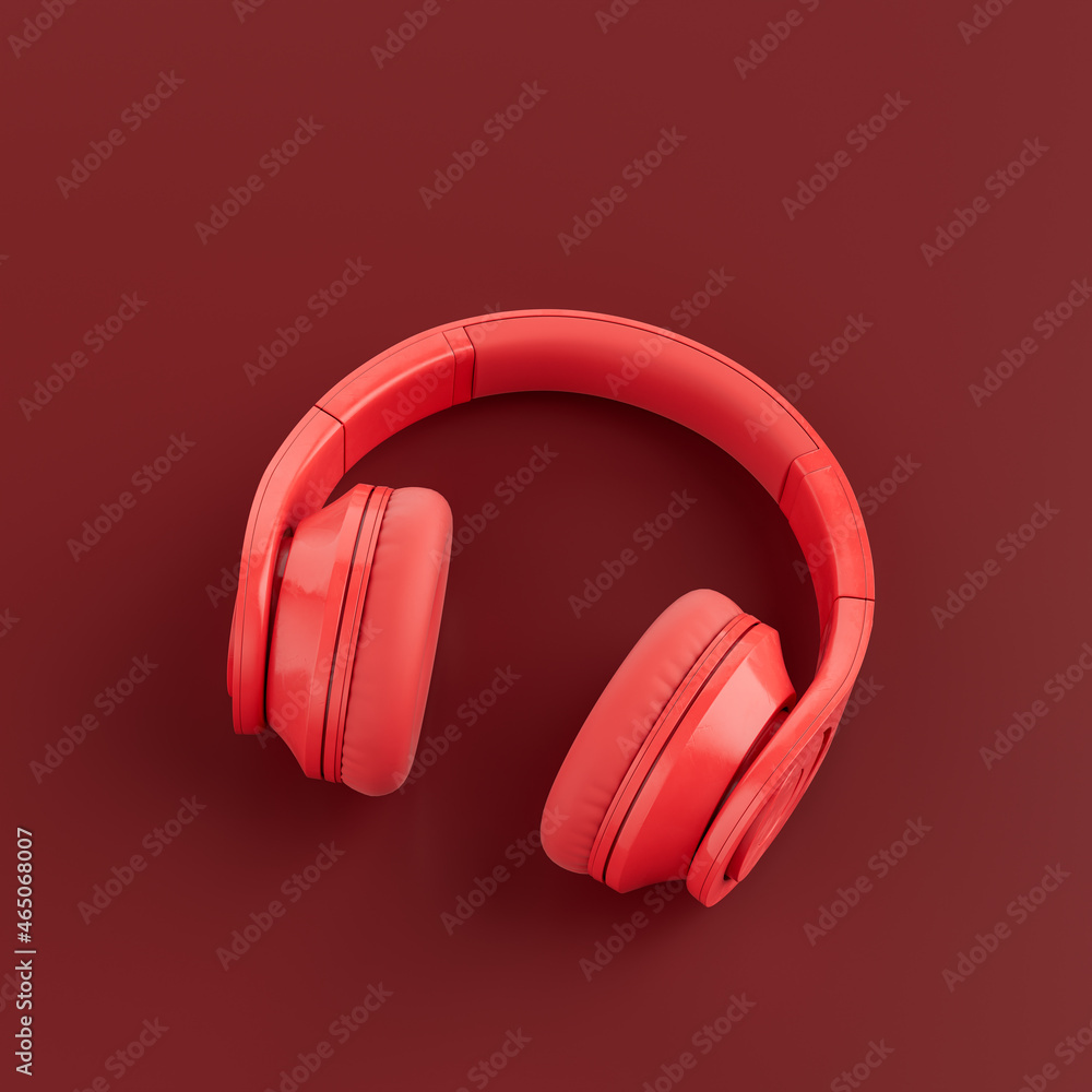 Monochrome red color over ear headphone in a red studio, top view,3d ...