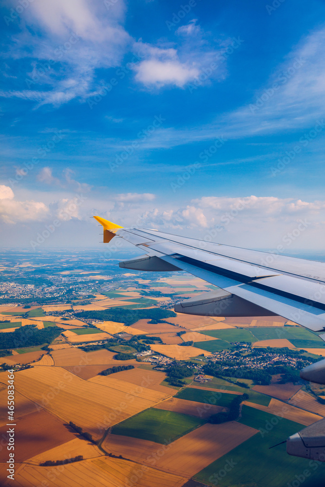 Airplane windows view above the earth on landmark down. View from an ...
