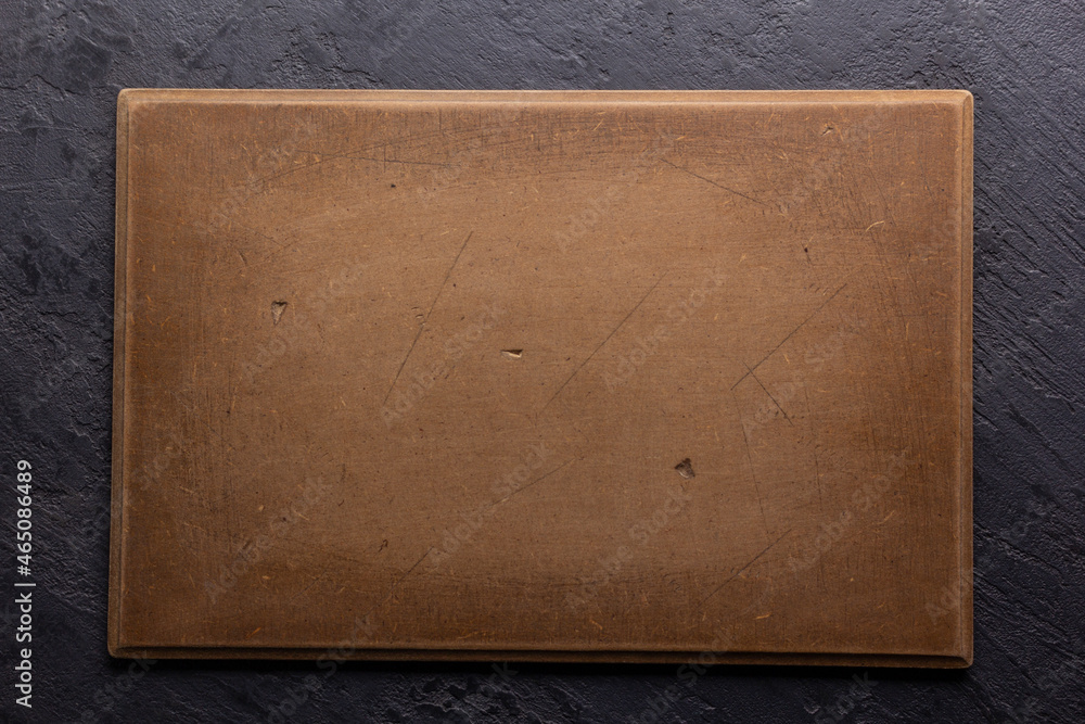 Wooden nameplate or sign board at wall background. Front view of name ...